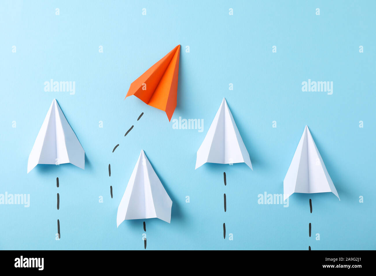 Paper airplanes on blue background, space for text Stock Photo - Alamy