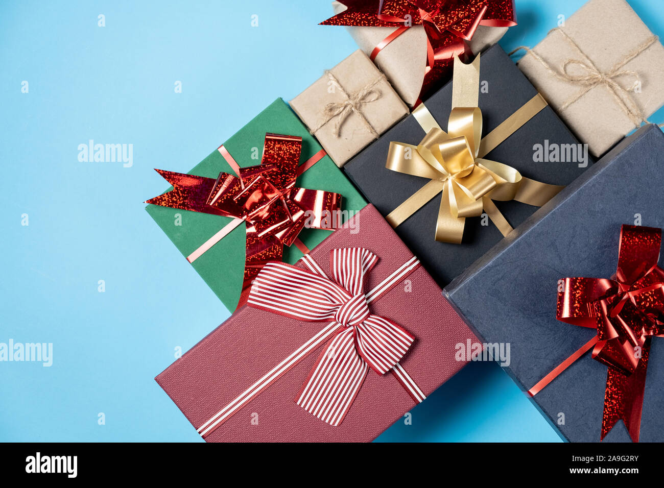 Valentine's Day background. Various gift boxes on pastel blue ...