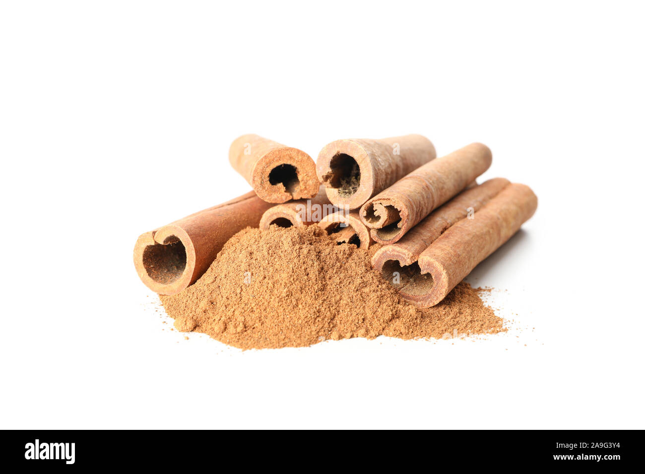 Cinnamon sticks and powder isolated on white background. Sweet spice ...