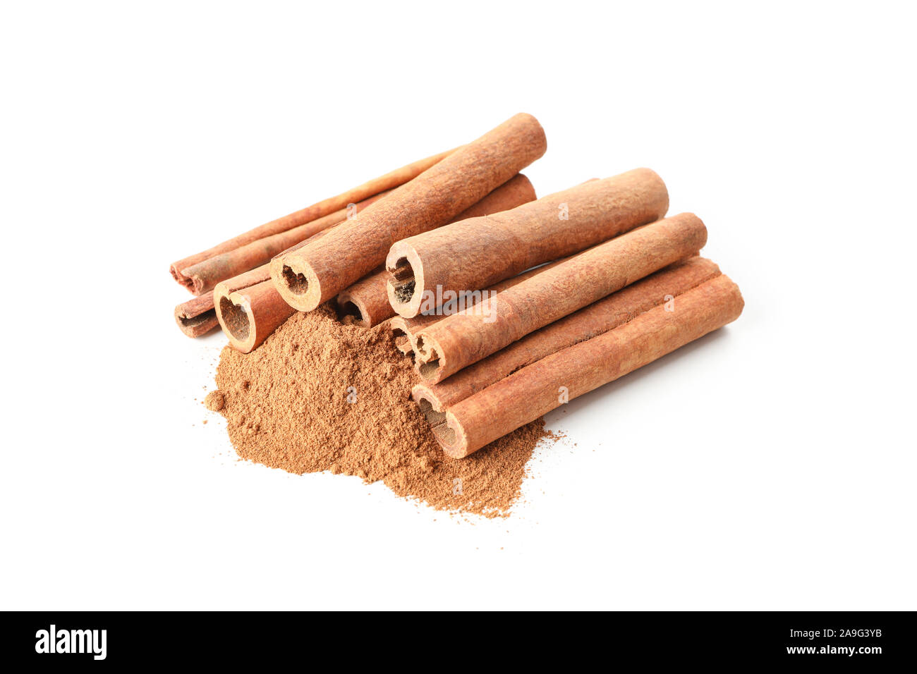 Cinnamon sticks and powder isolated on white background. Sweet spice ...