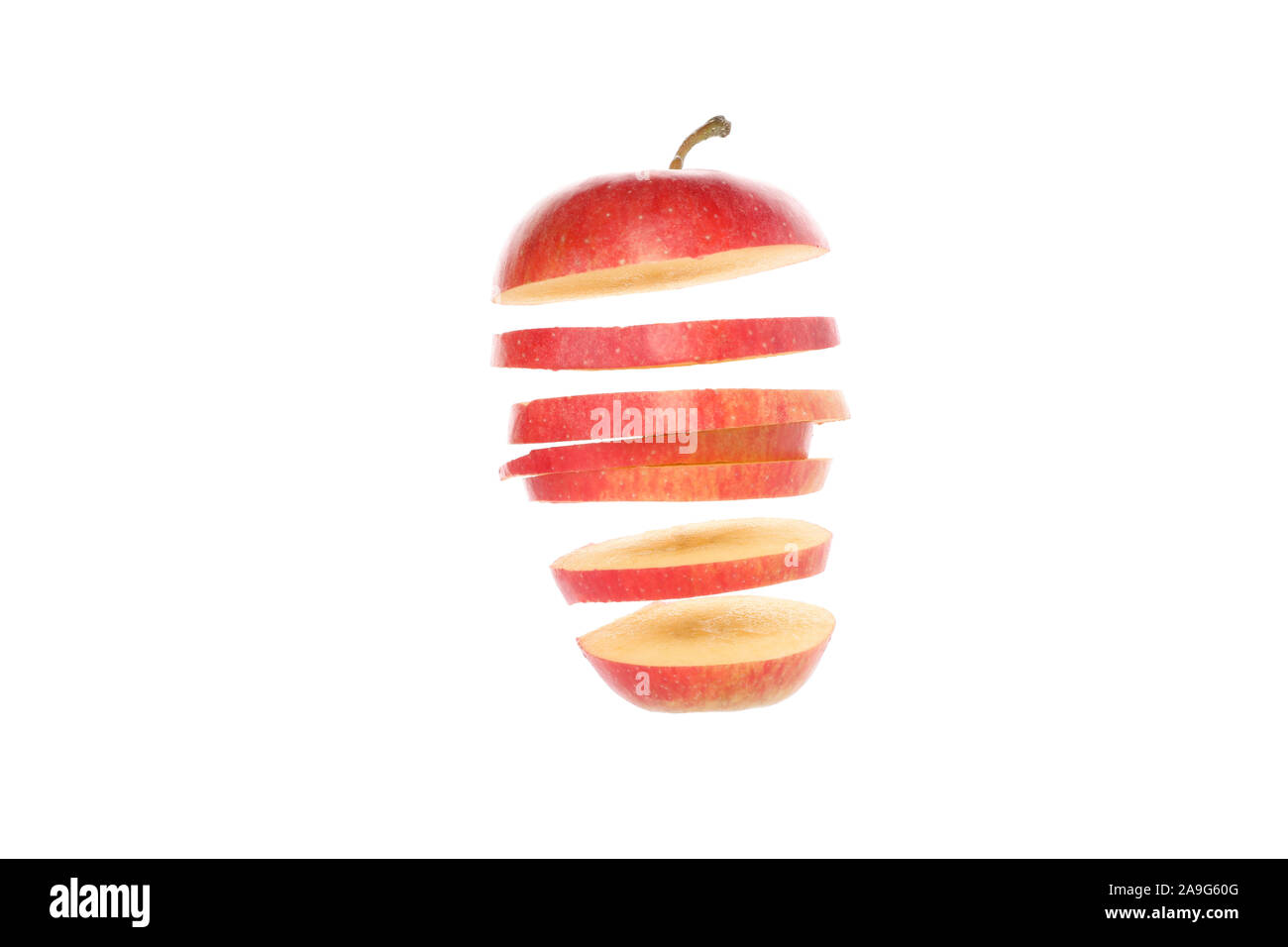Sliced red apple isolated on white background Stock Photo - Alamy