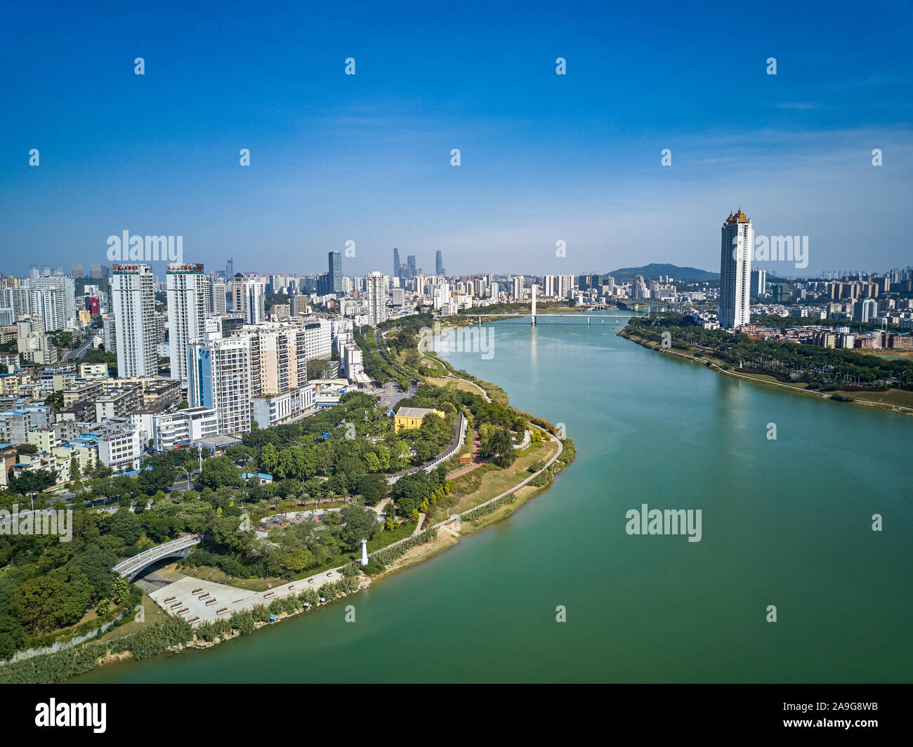 Aerial photos of high-rise residential area along the river and bridge ...