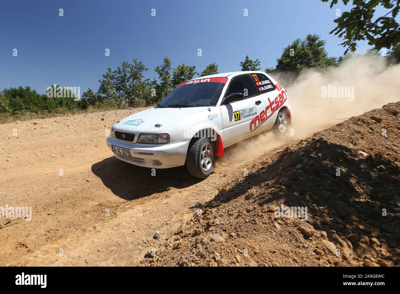 ISTANBUL, TURKEY - JULY 07, 2019: Hakan Gurel drives Suziki Baleno in ...