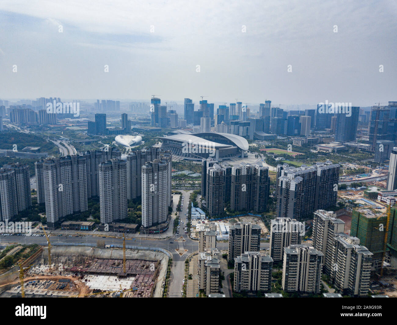 Aerial survey of high-rise buildings and stadiums in Asian urban areas ...