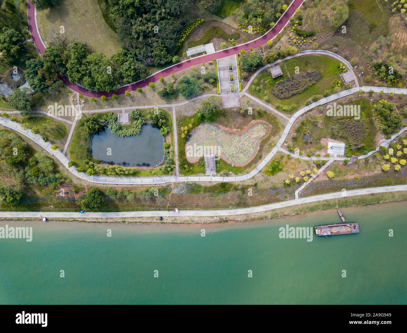 Vertical aerial photography of City Riverside Park footpath Stock Photo ...