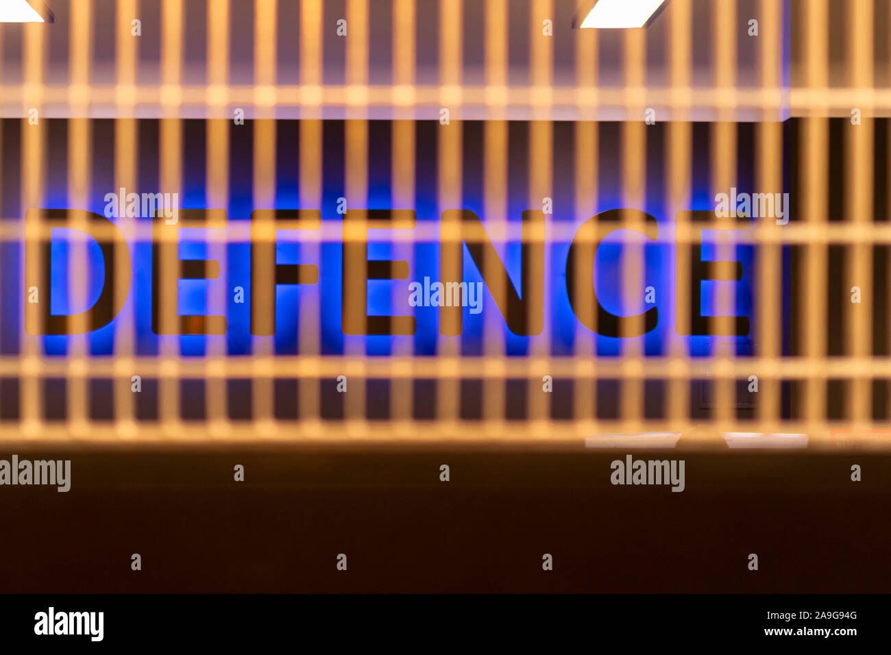 Defence sign behind grille in London Uk Stock Photo - Alamy