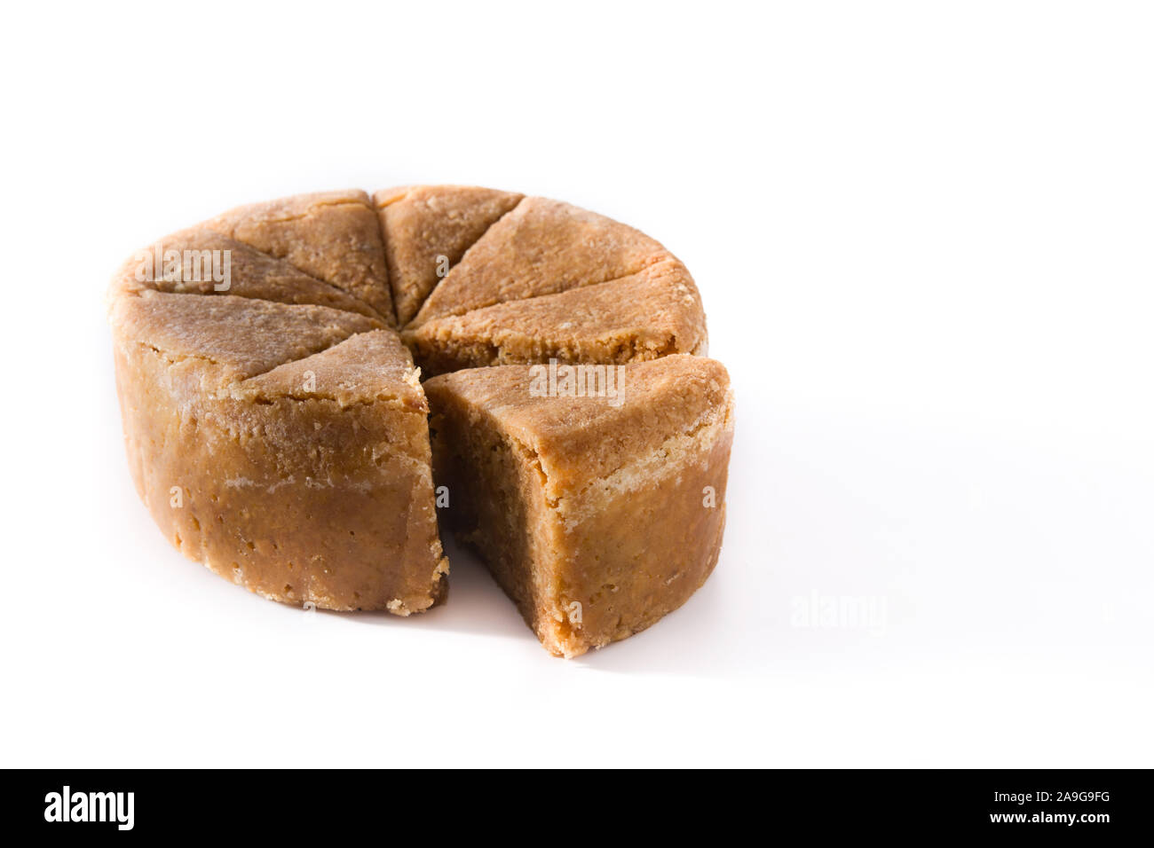 Traditional Christmas marzipan slice isolated on white background. Copy ...
