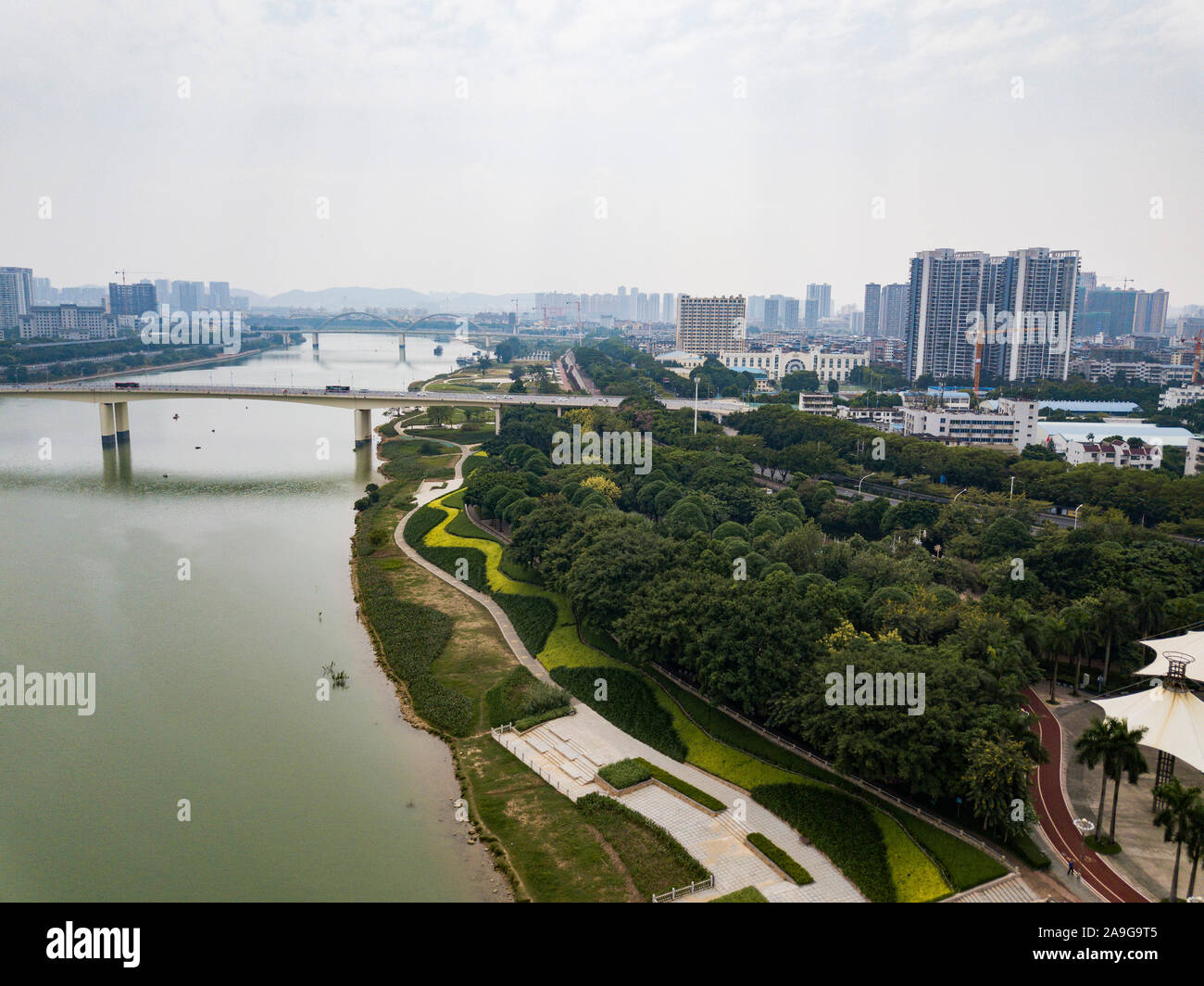 Aerial photos of the river crossing bridge and high-rise buildings ...