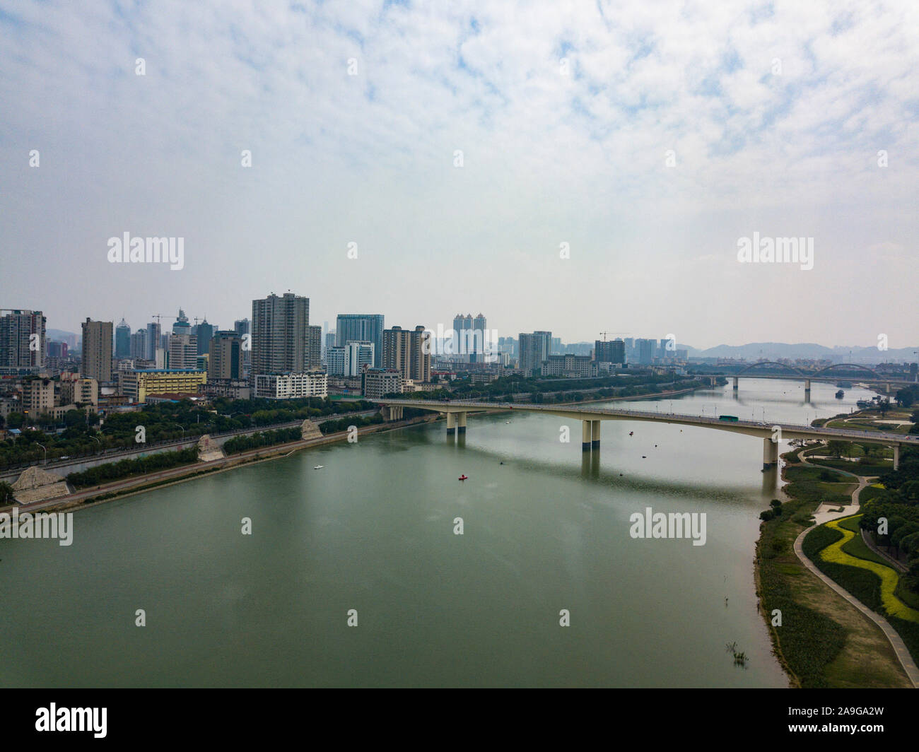 Aerial photos of the river crossing bridge and high-rise buildings ...