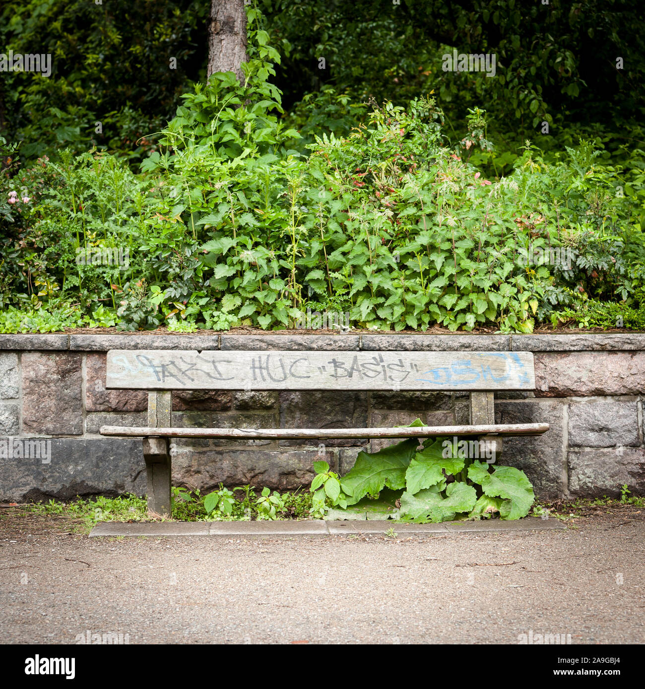 Park Bench. A park bench setting in an urban park. Hamburg, Germany ...