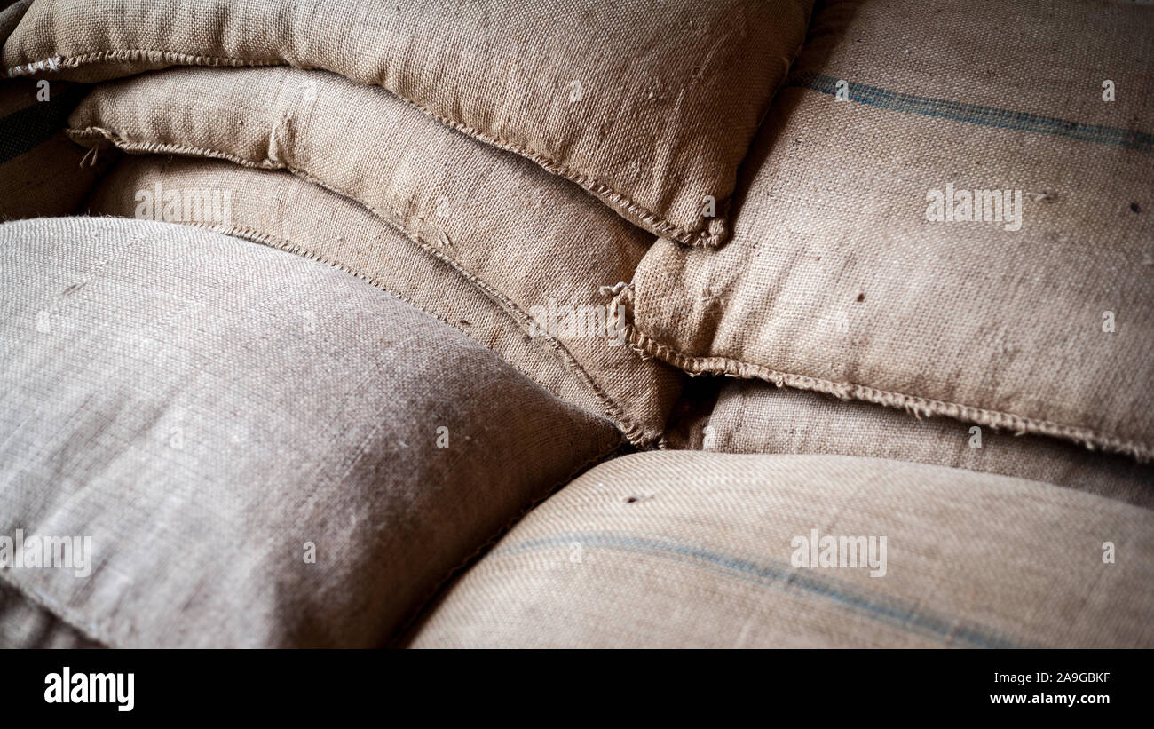 Hessian Sacks. Full frame detail from within a warehouse packaging ...