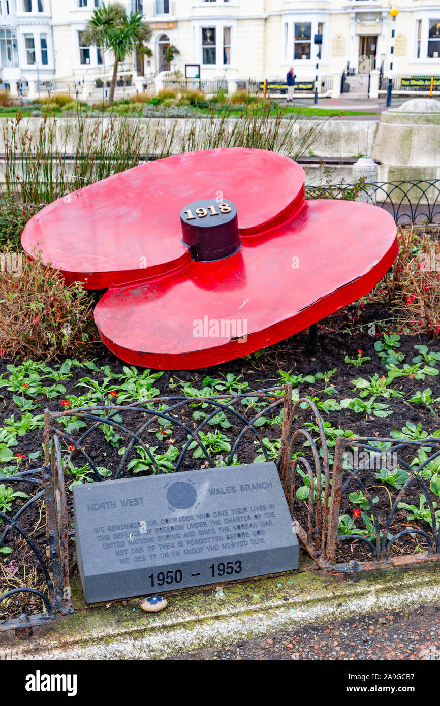 Fabricated steel poppy in a flower garden along the promenade at ...