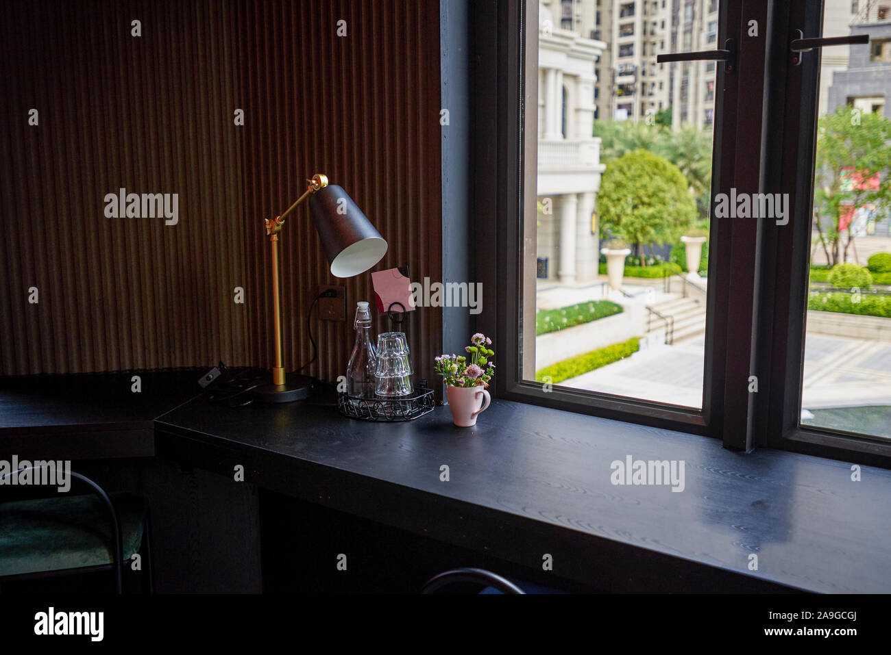 Seat at the corner of the window in the cafe after noon Stock Photo - Alamy