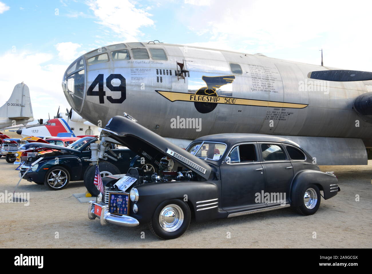 B-29 with vintage American car Stock Photo - Alamy