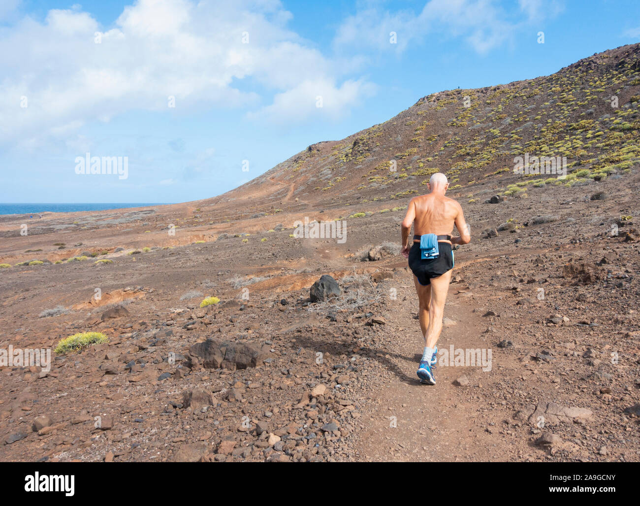 Old man running hi-res stock photography and images - Alamy