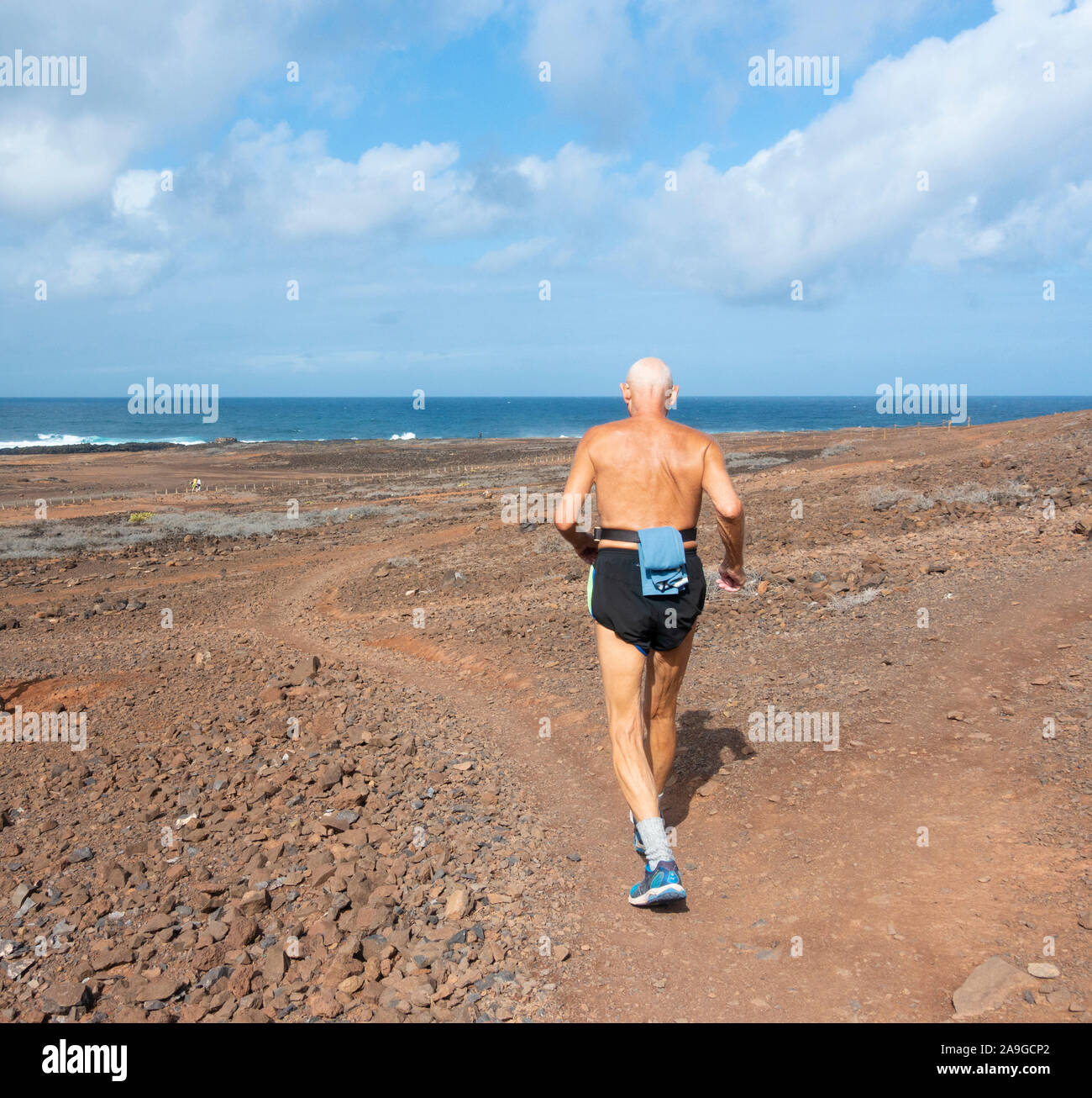 Old man running hi-res stock photography and images - Alamy