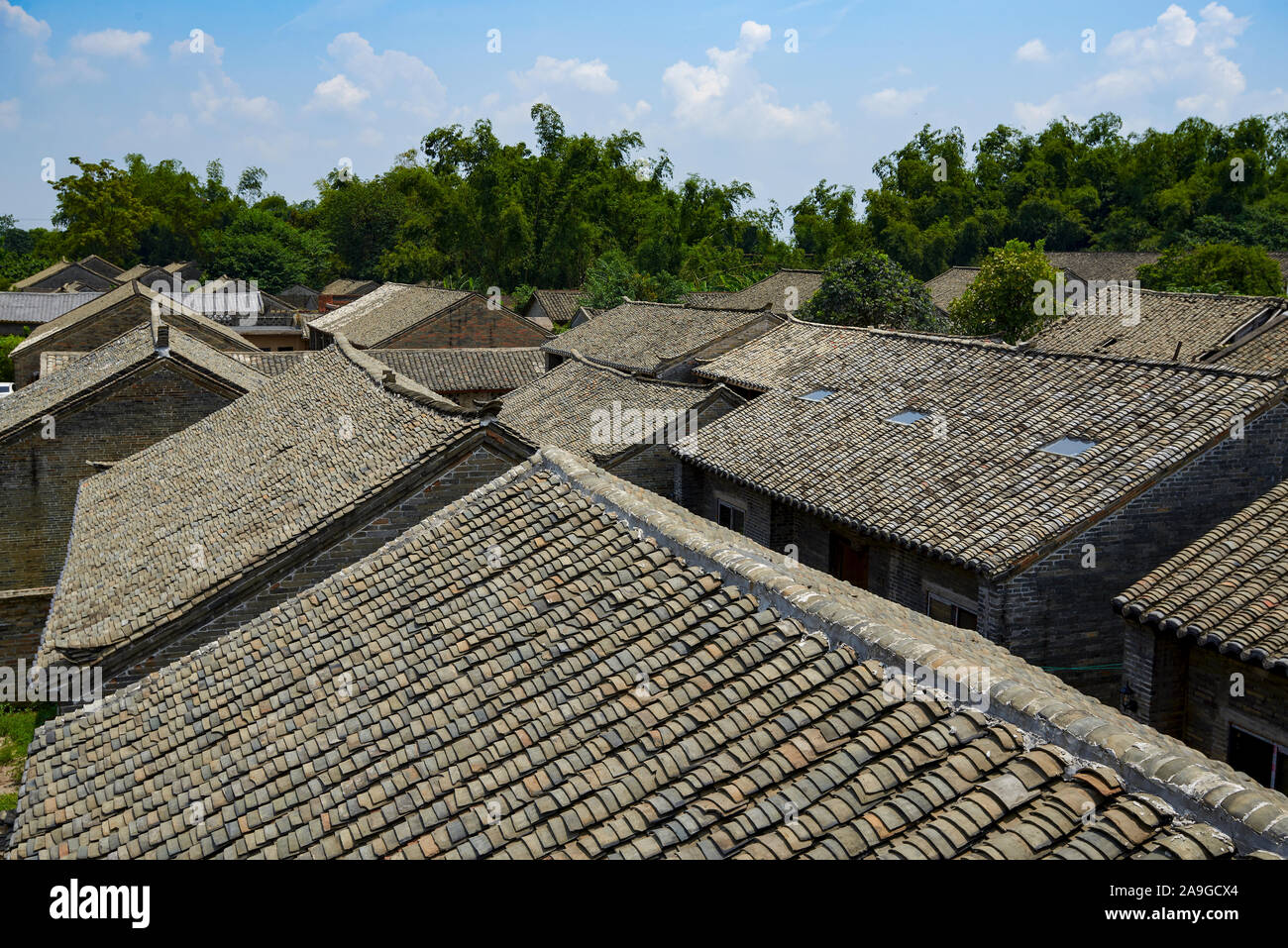 Tile Roof of Chinese Style Brick and Tile House Stock Photo - Alamy