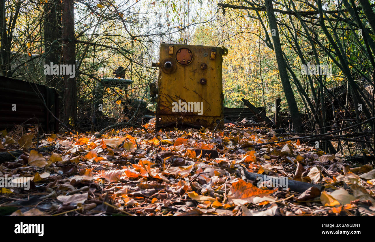 contaminated equipment dump in the Chernobyl forest Ukraine in autumn ...