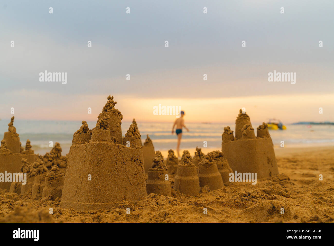 Children building a sand castle hi-res stock photography and images - Alamy