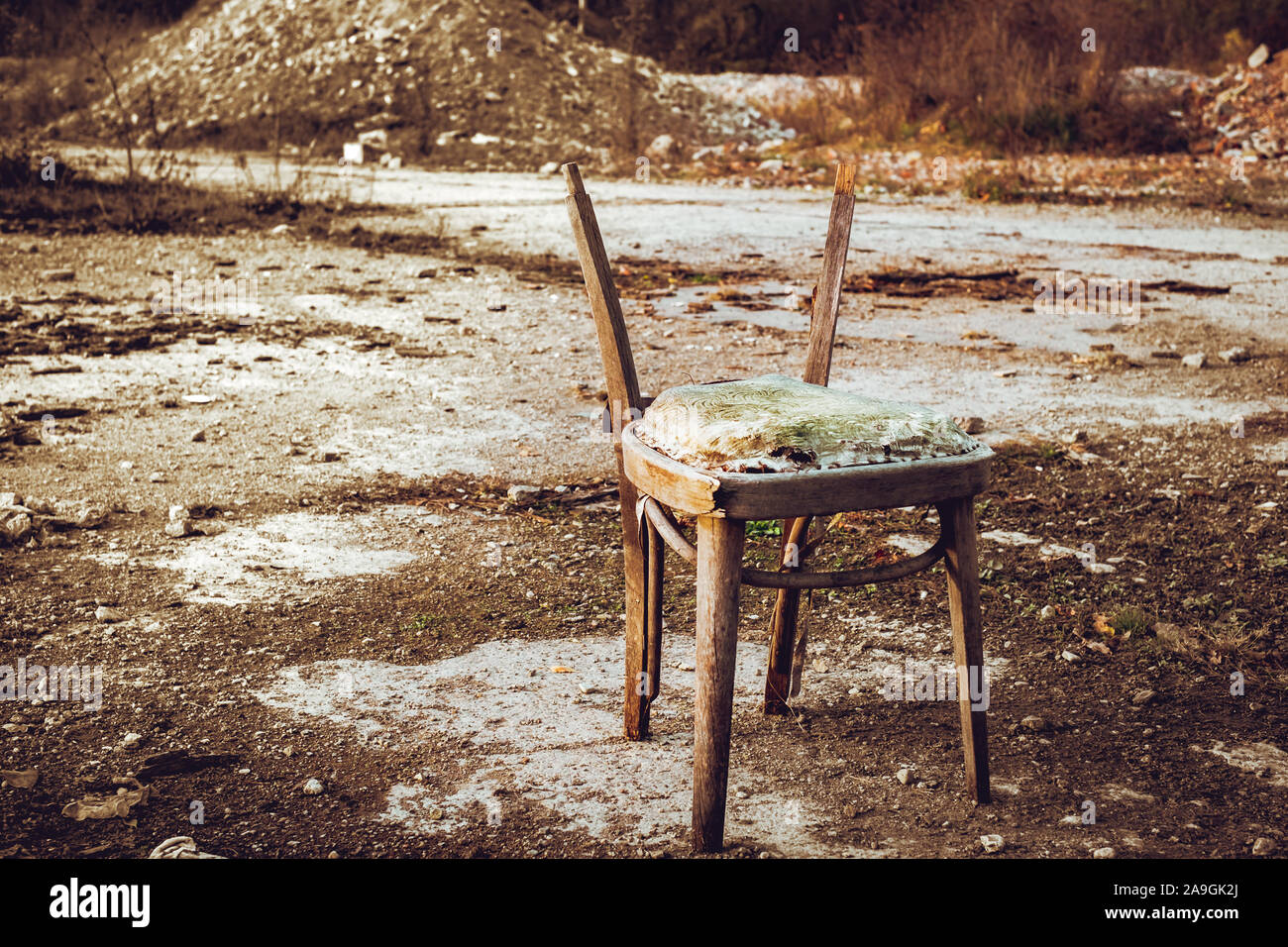 the remains of a abandoned broken chair Stock Photo - Alamy