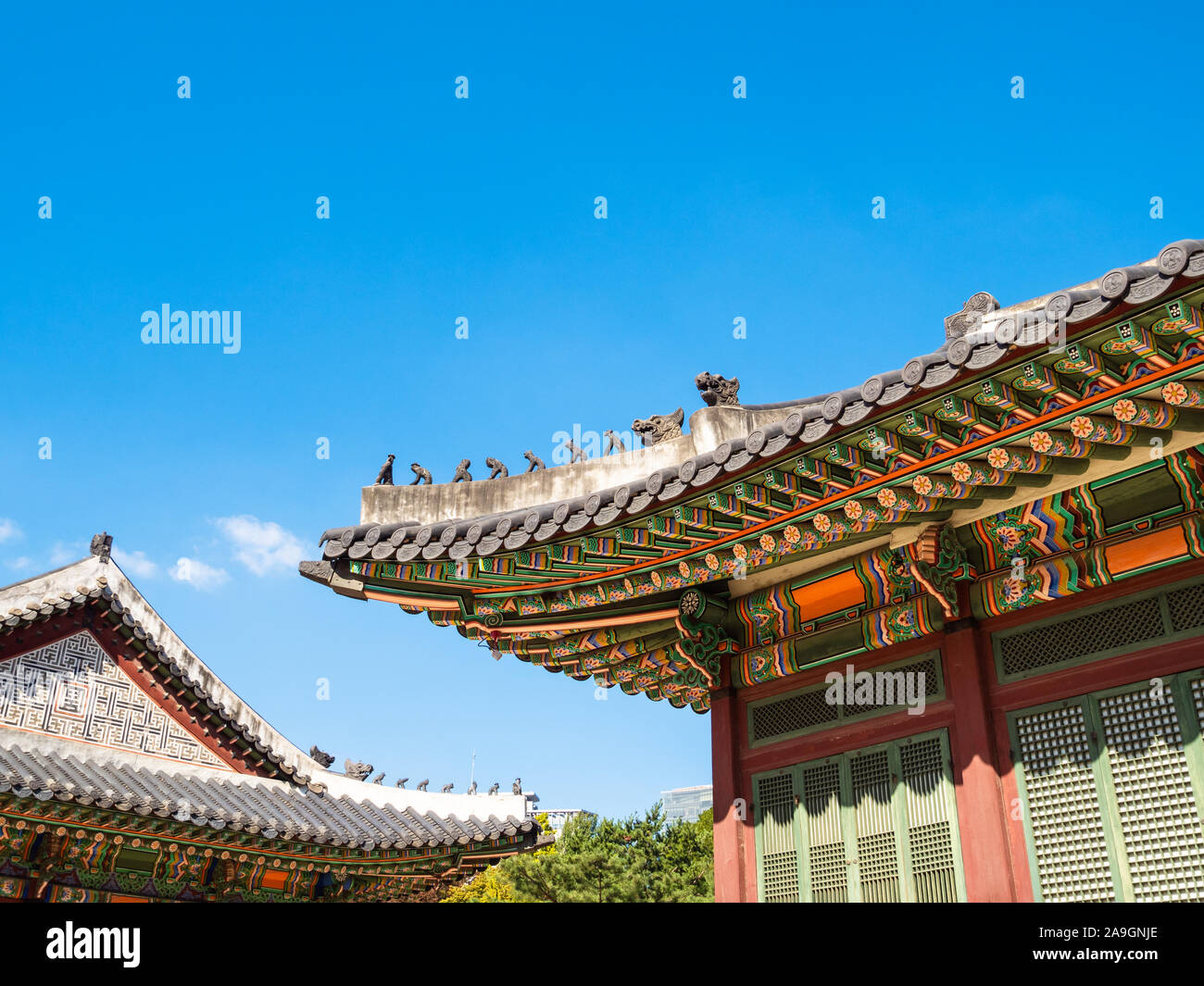 SEOUL, SOUTH KOREA - OCTOBER 30, 2019: roofs of two wooden buildings in ...