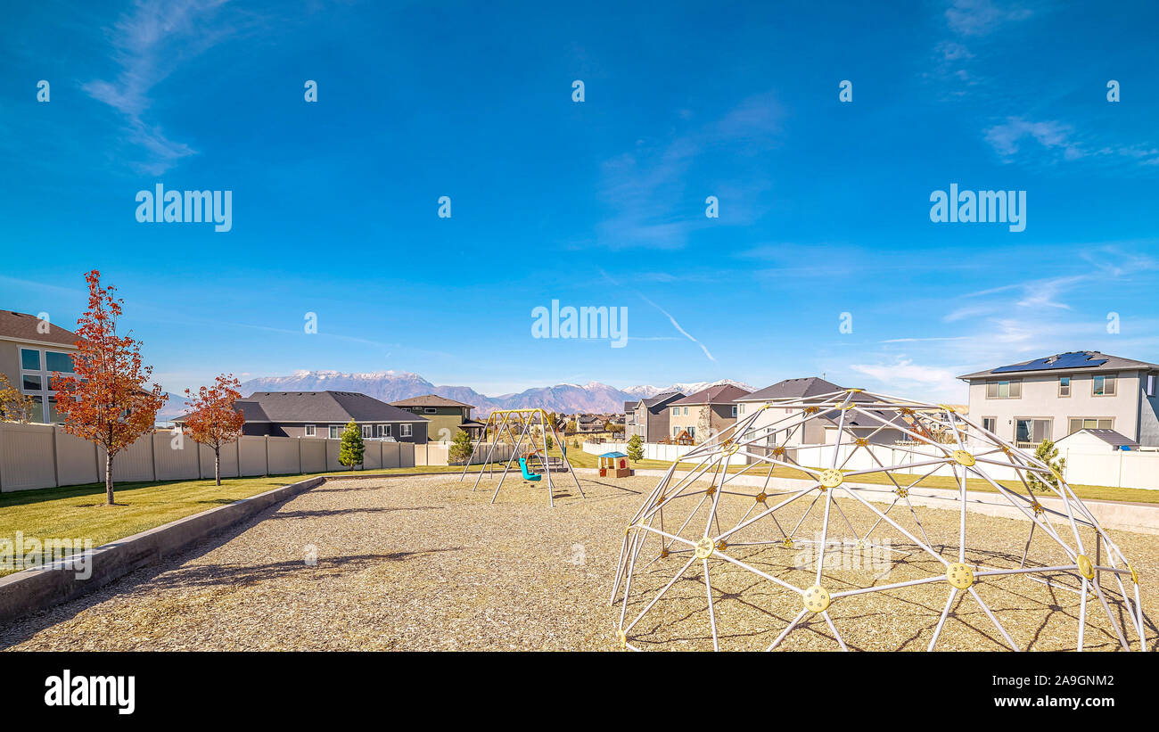 Panorama Climbing dome in a kids urban playground Stock Photo - Alamy