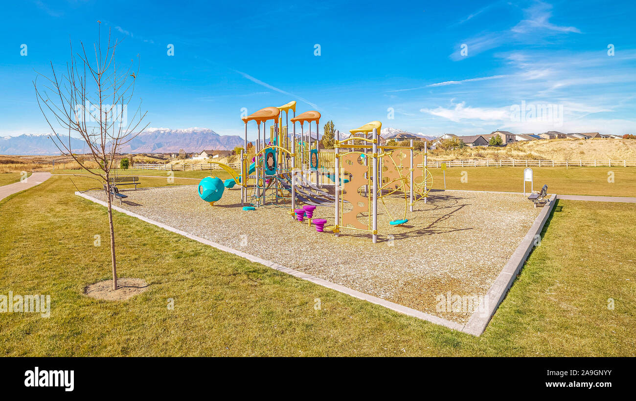 Panorama Corner perspective of a small kids playground Stock Photo - Alamy