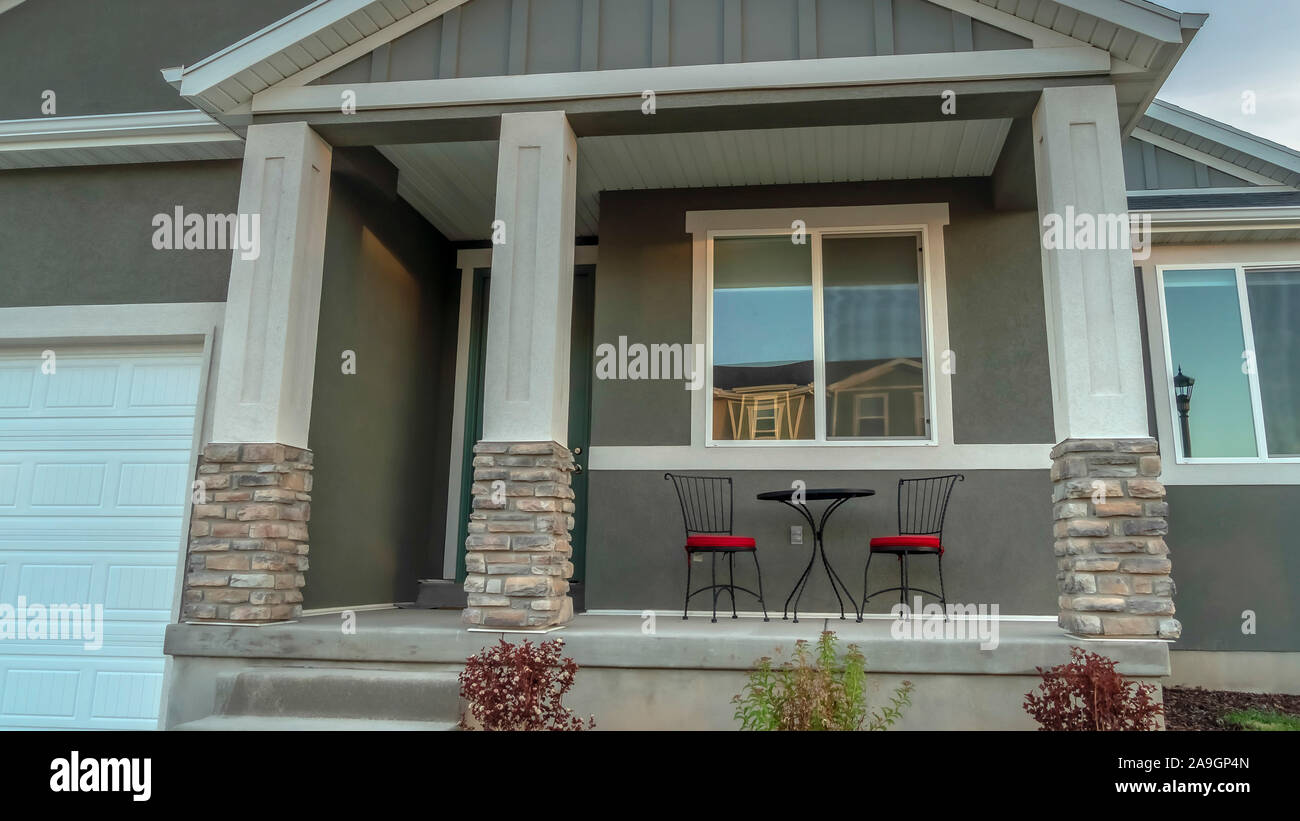 Panorama Facade of home with view of the front porch yard outdoor ...