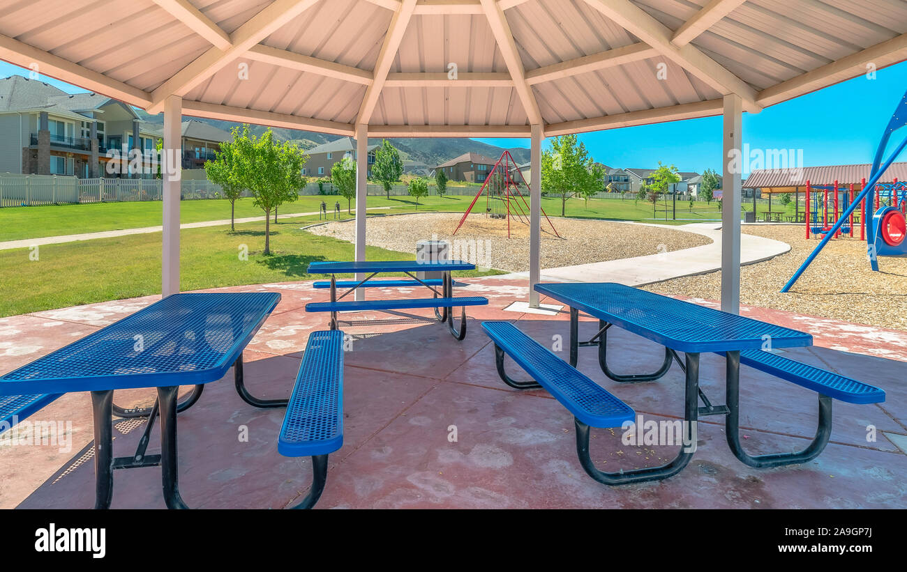 Panorama frame Blue picnic table and seats inside an octagon shape ...