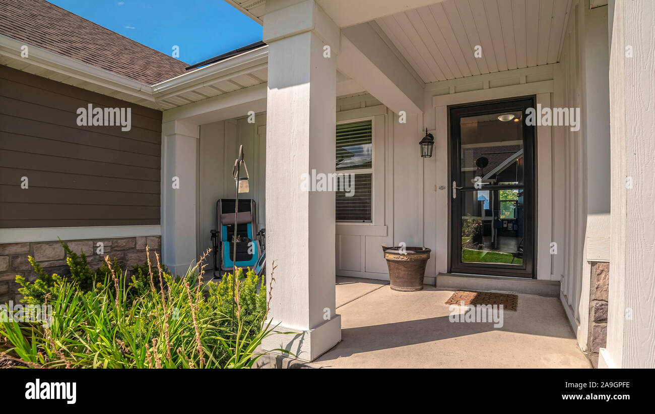 Panorama frame Covered porch and glass entrance door to a house Stock ...