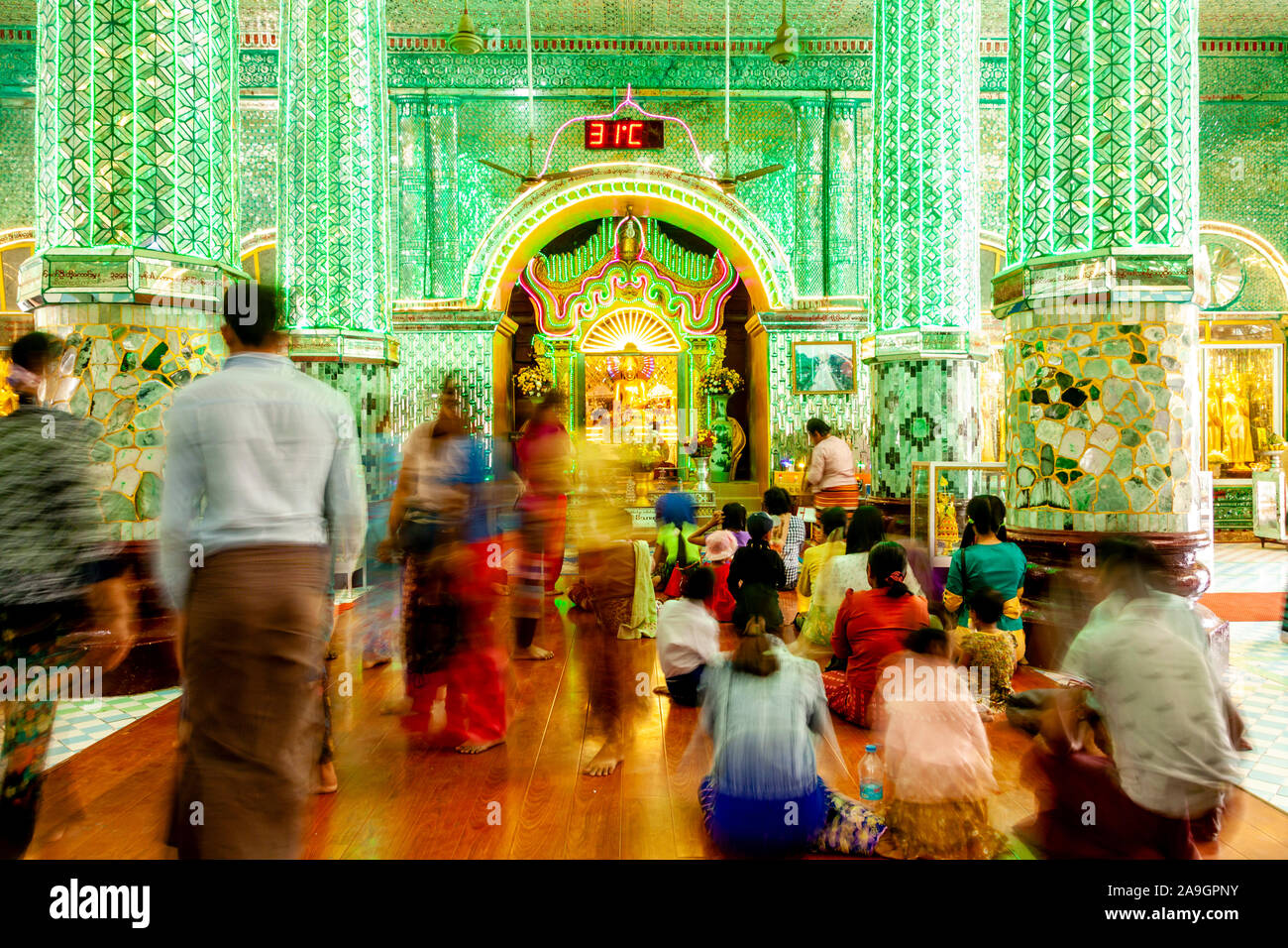 Burmese People Praying At The Kaung Mu Taw (Kaunghmudaw) Pagoda ...