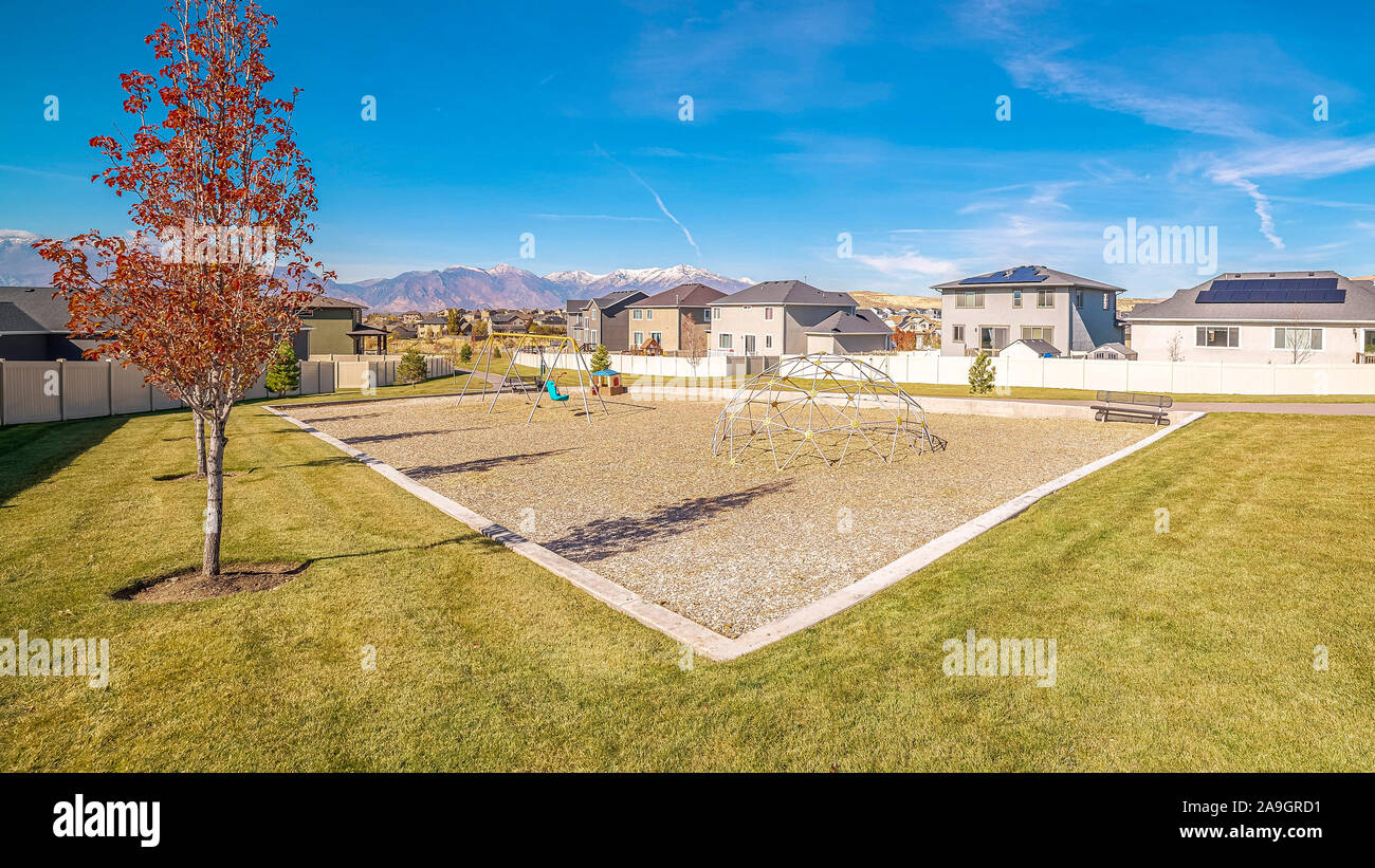 Panorama frame Kids playground on a housing development near sunset ...