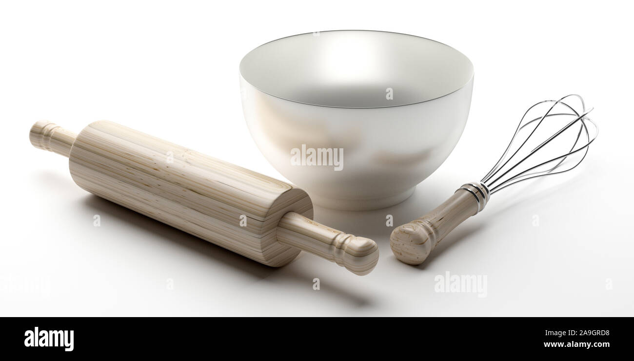 Wire whisk, rolling pin and mixing bowl isolated against white ...