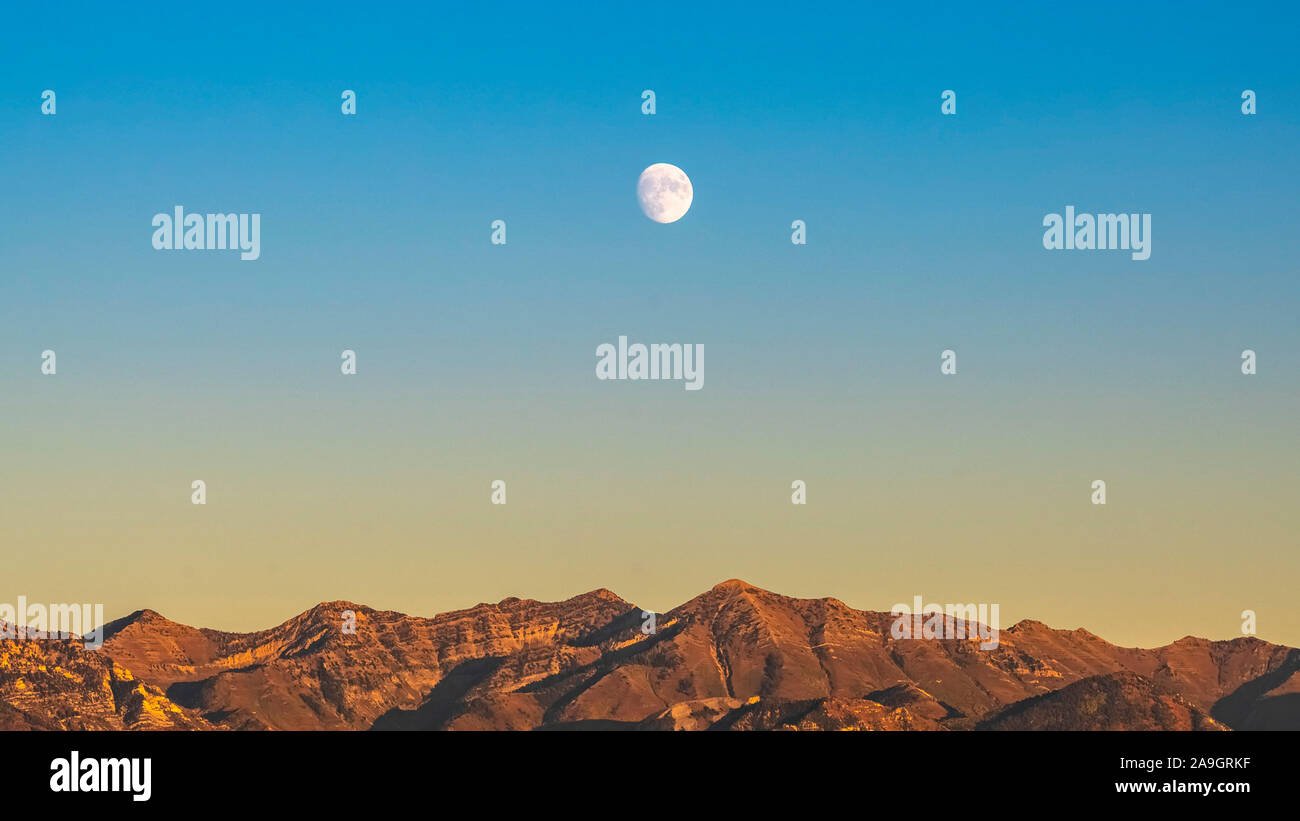 Panorama frame Moonrise over the rugged mountains in Provo Canyon Stock ...