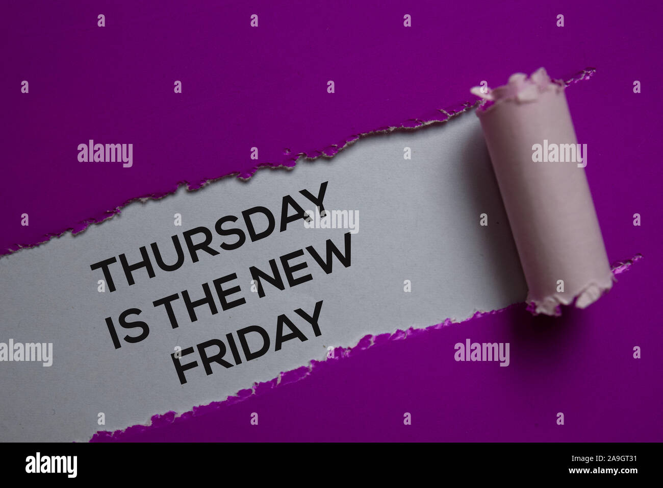 Thursday Is The New Friday Text written in torn paper Stock Photo - Alamy