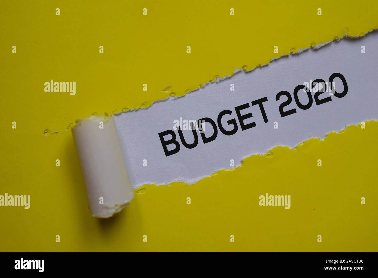 Budget 2020 Text written in torn paper Stock Photo - Alamy