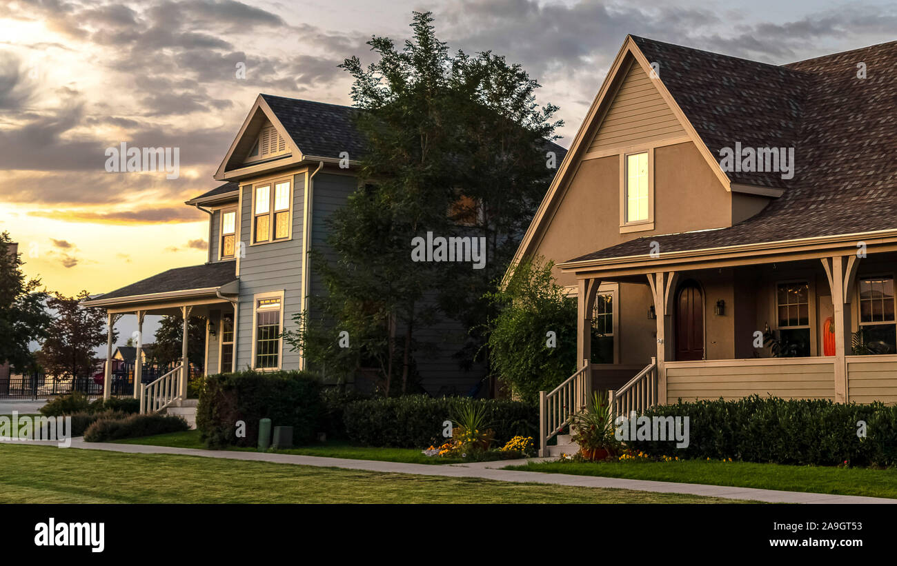 Panorama frame Row of houses on an estate at sunset Stock Photo - Alamy