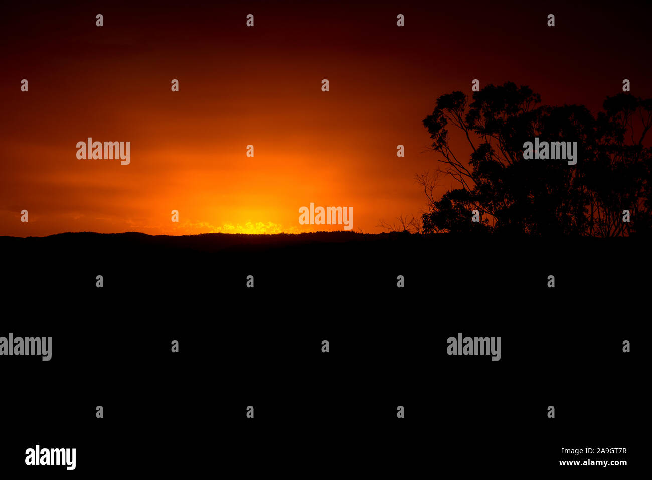 Vibrant red sunset caused by bushfire smoke and dust in the blue ...