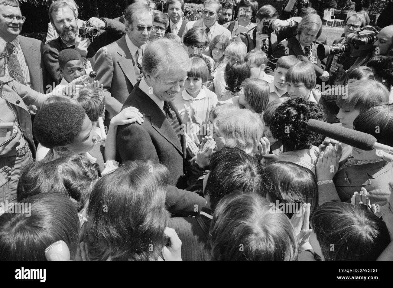 U.S. President Jimmy Carter surrounded by school children, North ...