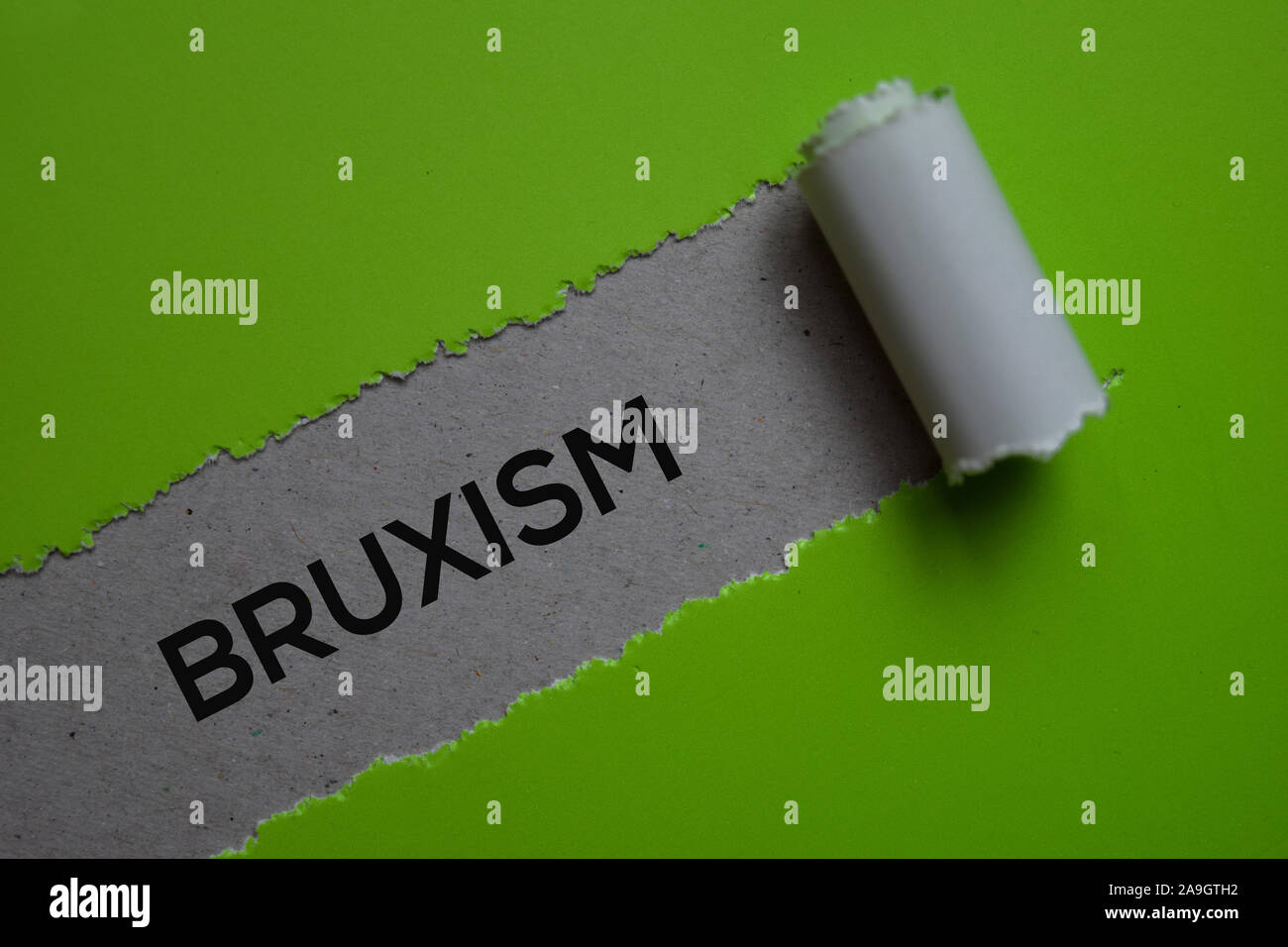 Bruxism Text written in torn paper. Medical concept Stock Photo - Alamy