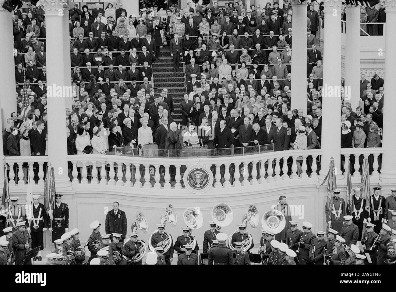 Chief Justice Earl Warren administering the oath of office to Richard M ...
