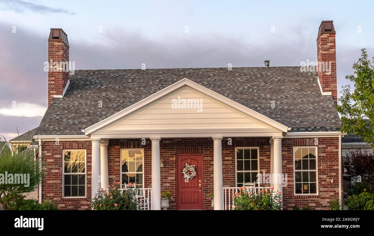 Panorama Modern face brick townhouse front facade near sunset Stock ...