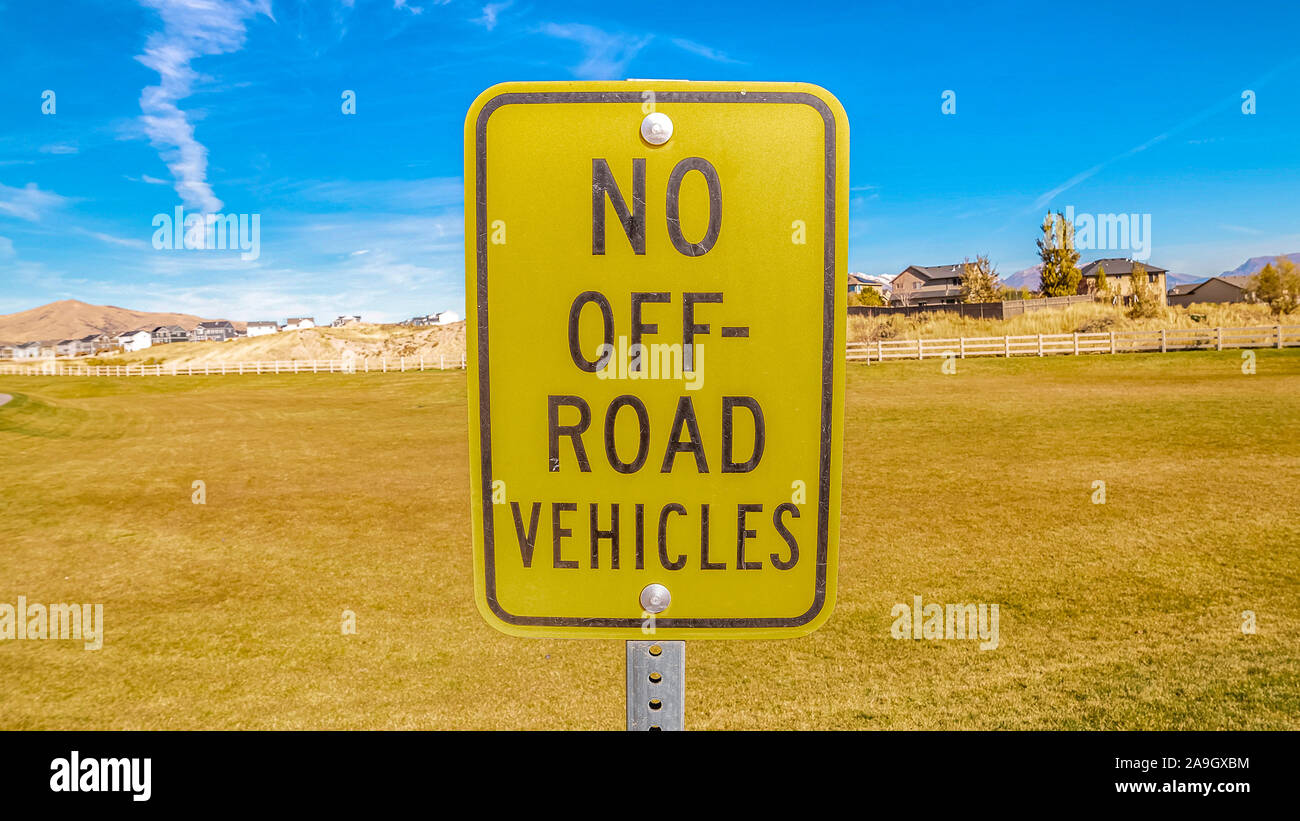 Panorama Road sign on a grassy field - No Off-road vehicles Stock Photo ...
