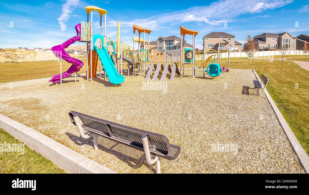 Panorama Small kids playground with colorful slides during day Stock ...