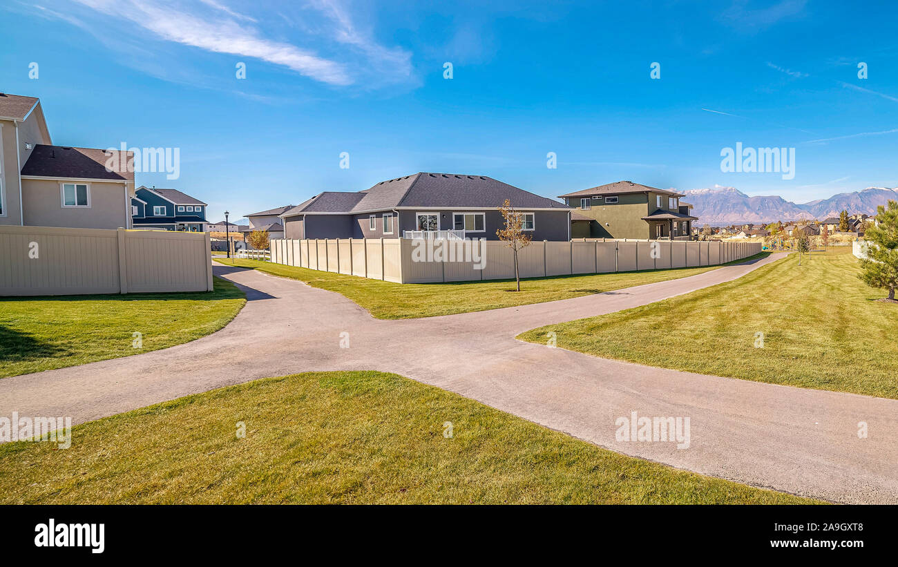 Panorama Two intersecting paved pedestrian walkways during day Stock ...
