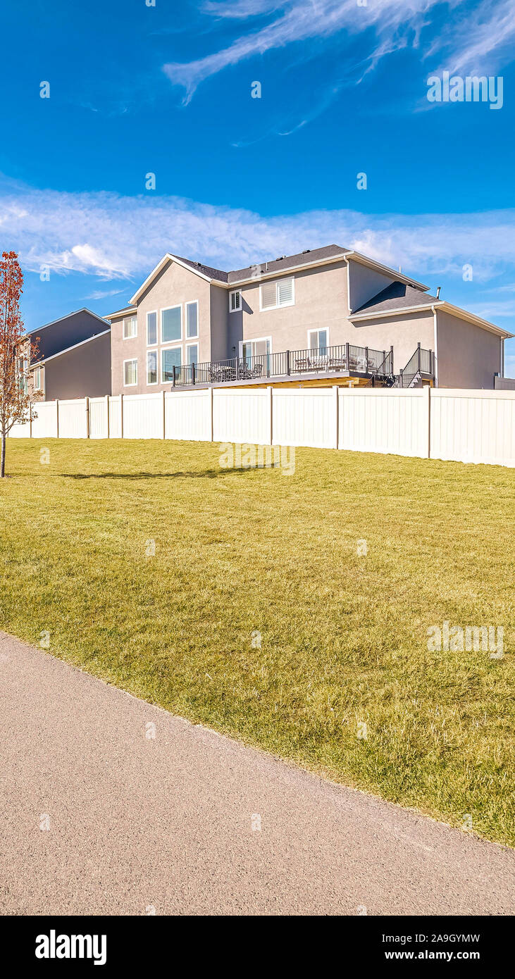 Vertical Curving pedestrian walkway in a greenbelt area Stock Photo - Alamy