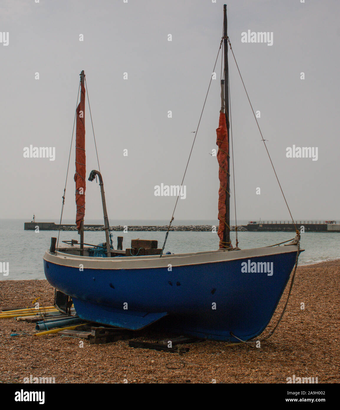 Traditional sailing blue fishing boat Stock Photo - Alamy