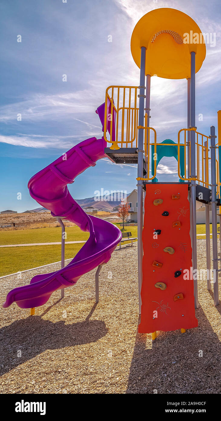 Vertical frame Colorful slides and equipment on a playground Stock ...