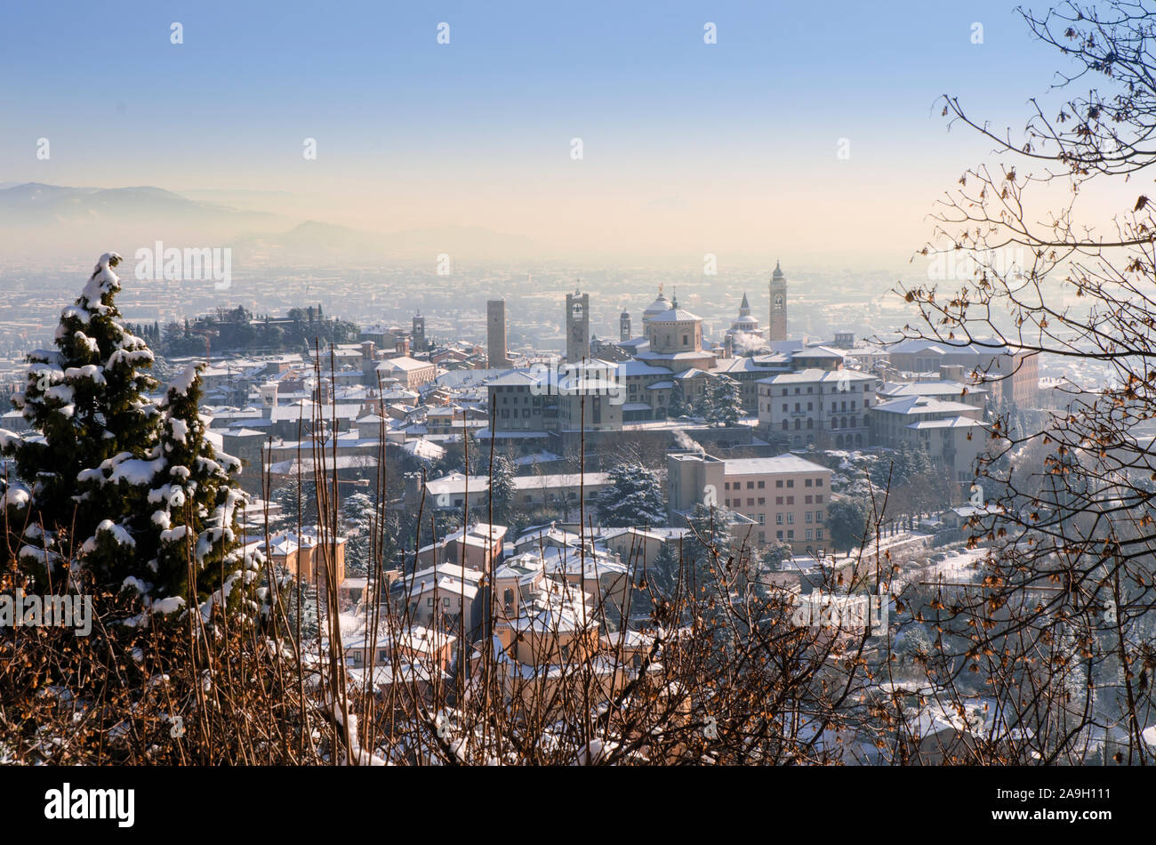 Beautiful winters scene looking down on snow covered buildings and ...