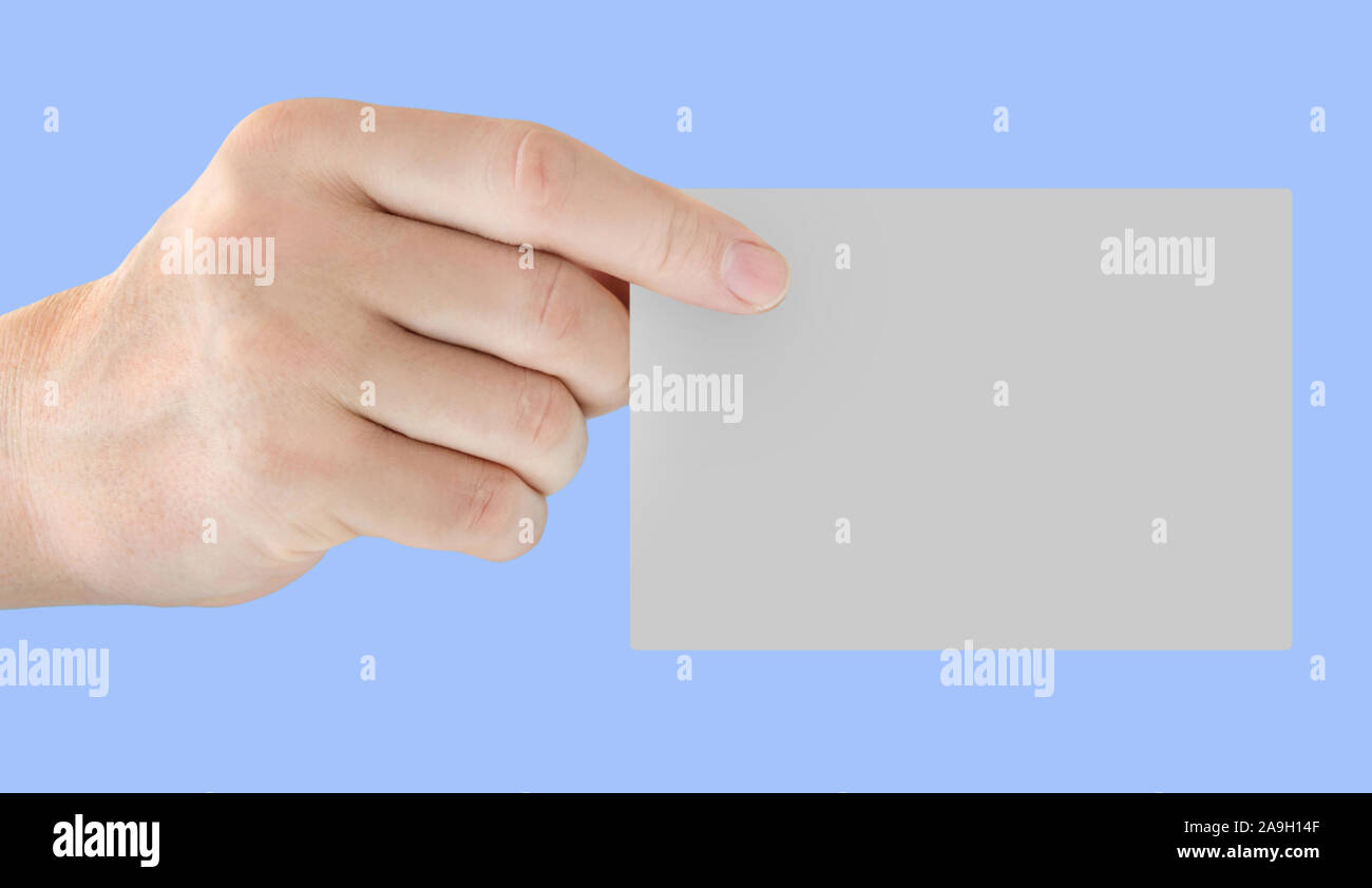 Male hand and label Stock Photo - Alamy